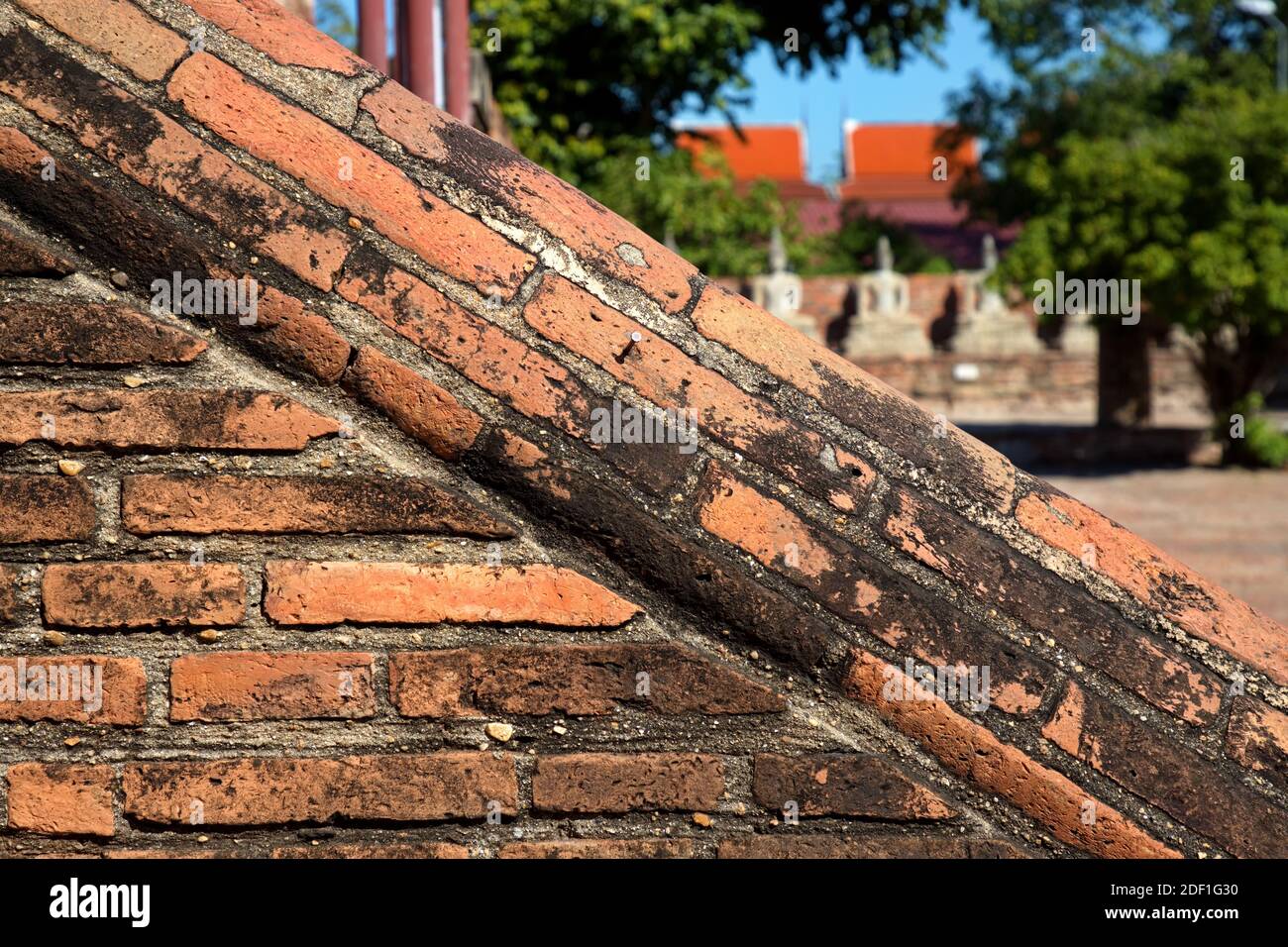 Brick railing of a temple in Thailand With a blur background of the ...