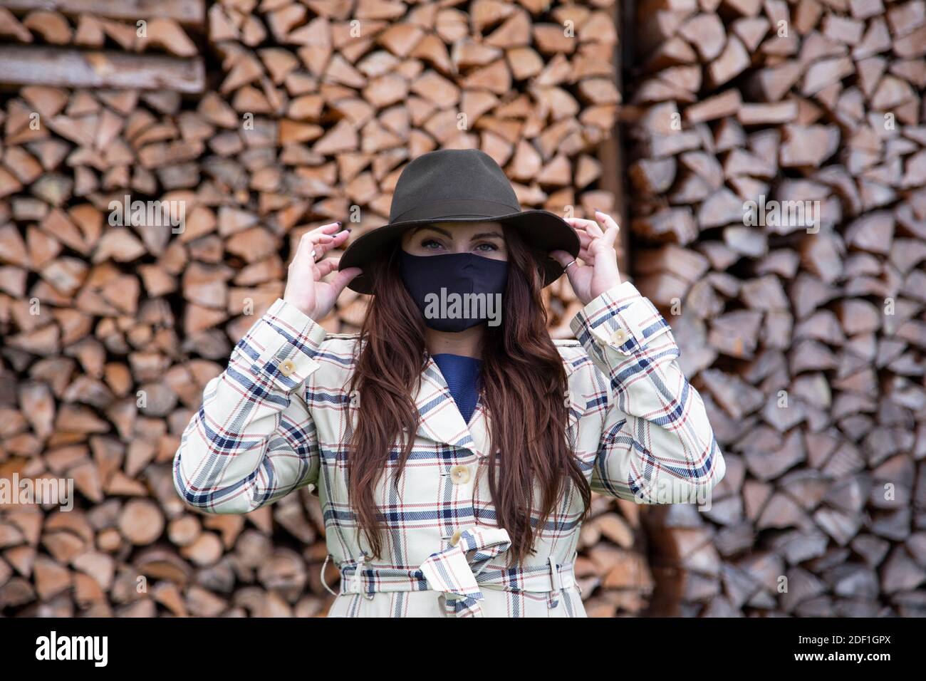 Touching a mask hi-res stock photography and images - Alamy