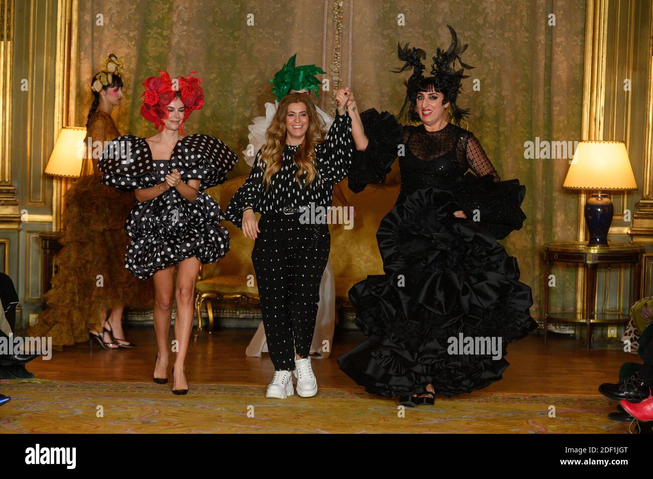 Designer Juana Martin and Rossy de Palma walk the runway during the ...