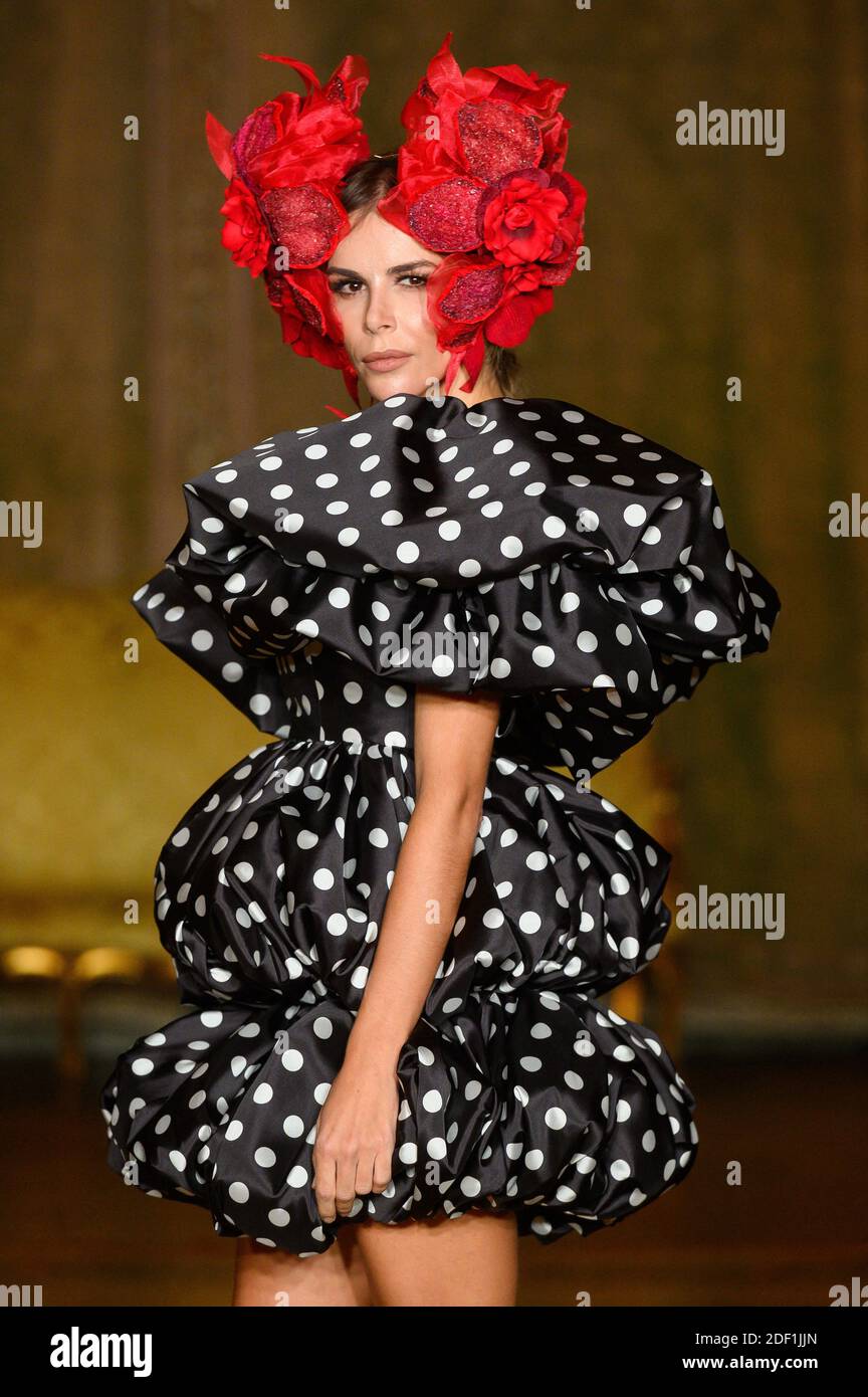 A model walks the runway during the Juana Martin Haute Couture Spring ...