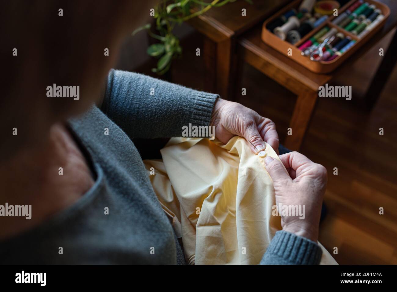 Woman female sewing hi-res stock photography and images - Alamy