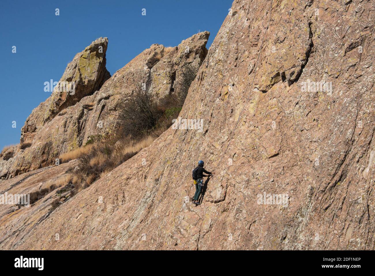 Rock climber on Peña de Bernal, UNESCO site and one of the world’s ...