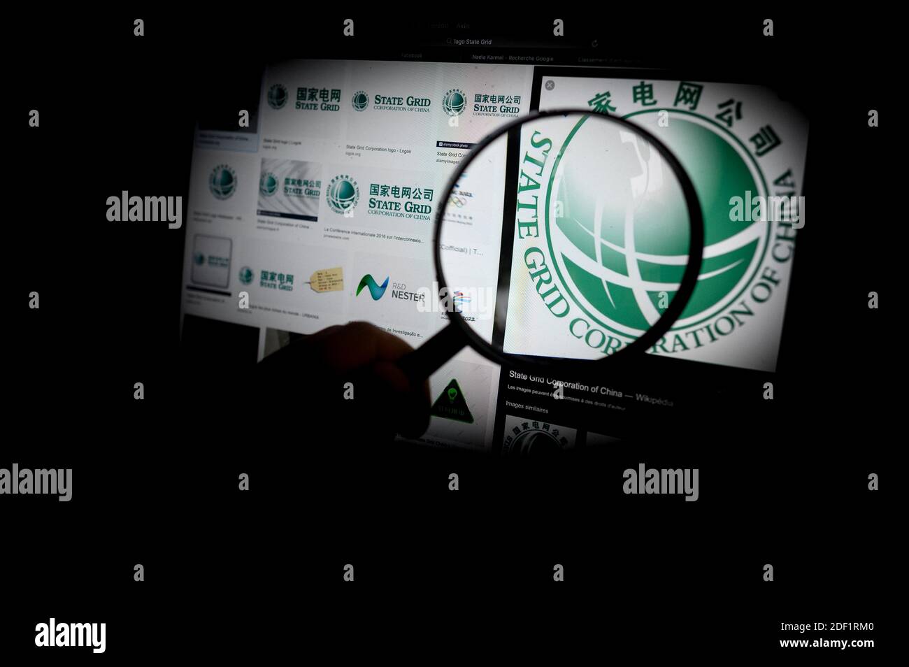 Illustration State Grid (logo) is seen on the screen in Paris on ...