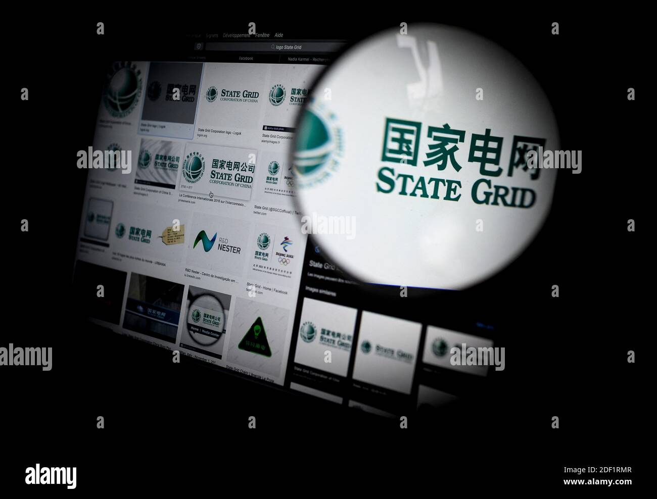 Illustration State Grid (logo) is seen on the screen in Paris on ...