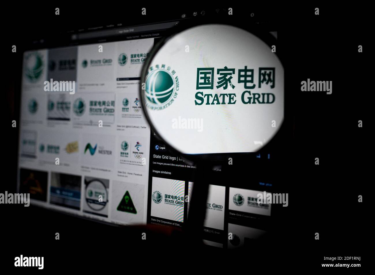 Illustration State Grid (logo) is seen on the screen in Paris on ...