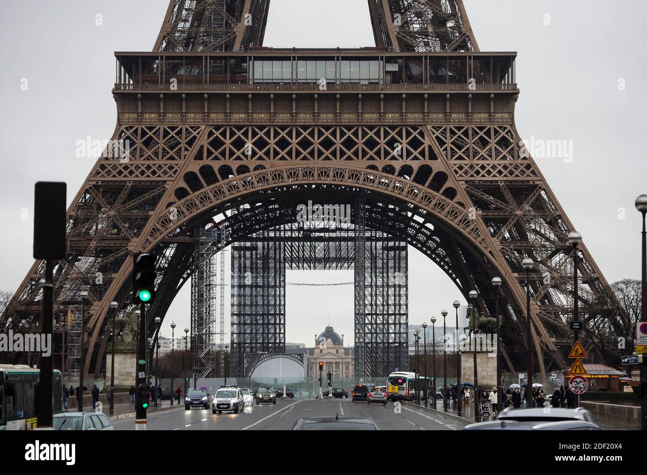 A picture shows scaffolding under the Eiffel Tower for reconstruction ...
