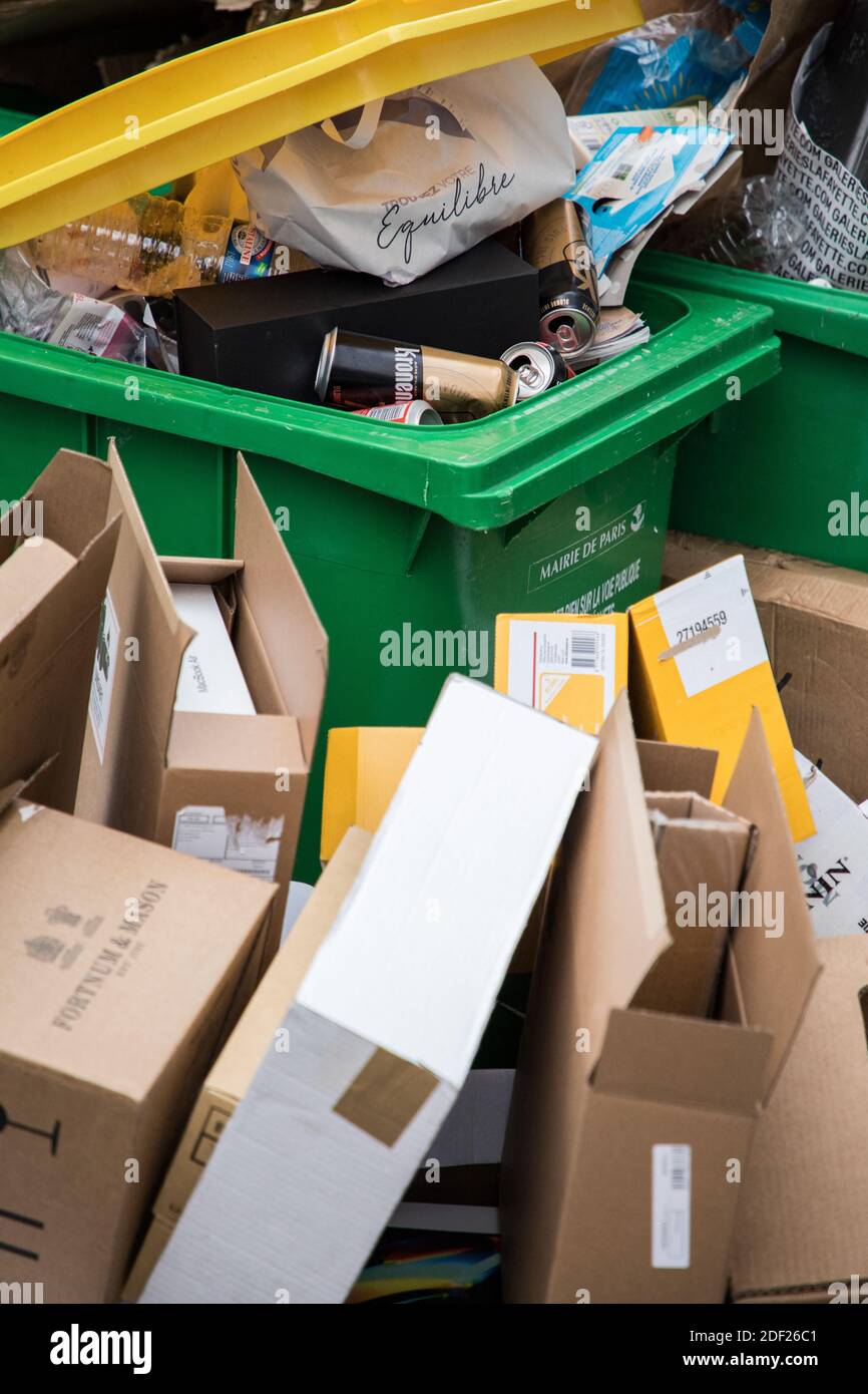 Overflowing trash bins are seen in a street on February 3, 2020 in ...