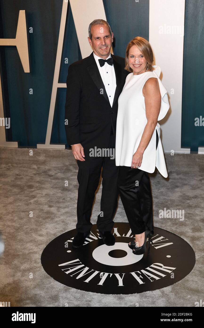 John Molner and Katie Couric attending the Vanity Fair Oscar party at ...