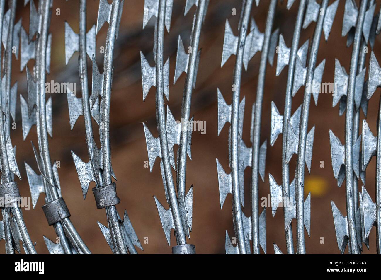 form of sharp barbed wire which is usually used for building safety ...