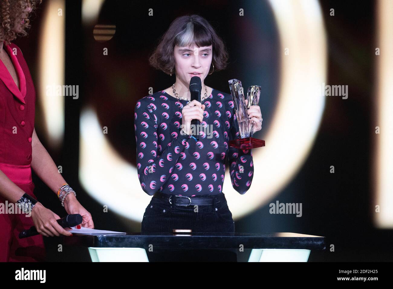 Claire Pommet, a.k.a. Pomme celebrates after receiving the award for ...