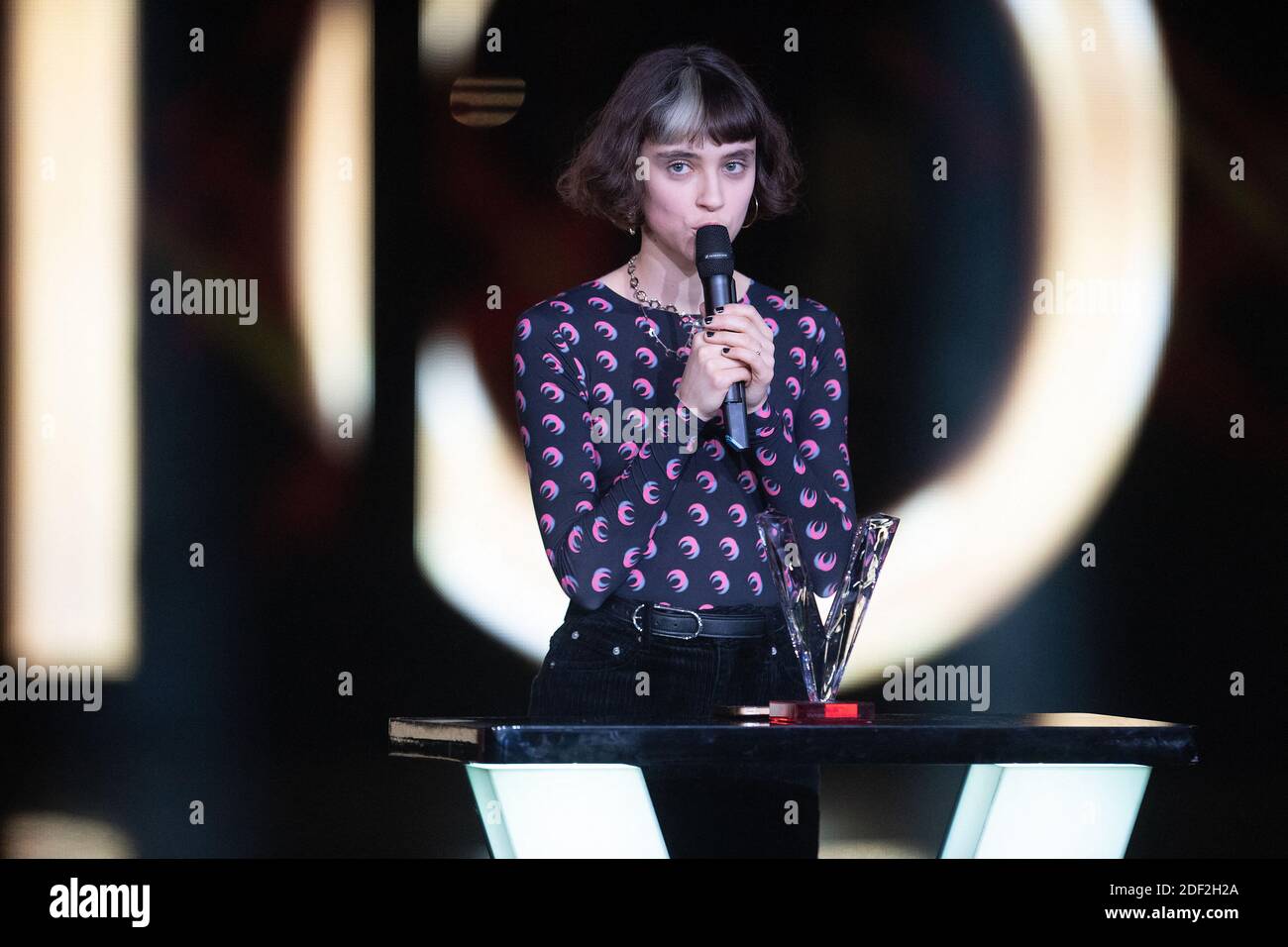 Claire Pommet, a.k.a. Pomme celebrates after receiving the award for ...