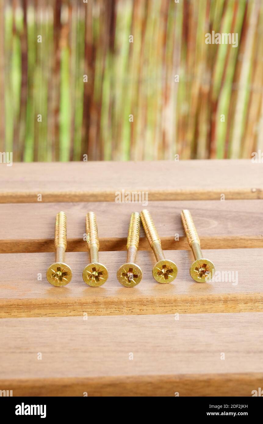 Brown wooden plank screws hi-res stock photography and images - Alamy
