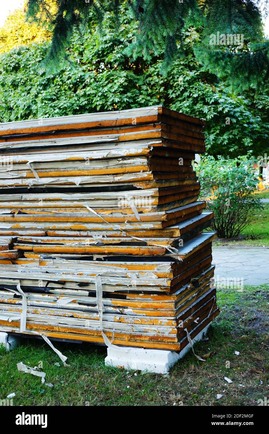 A vertical shot of a stack of old used wood material Stock Photo - Alamy