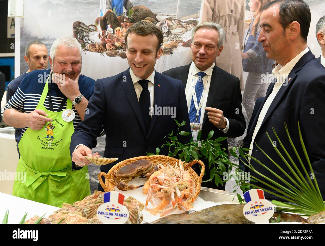 Guest, Emmanuel Macron, Jacques Woci and Eric Bothorel. French ...