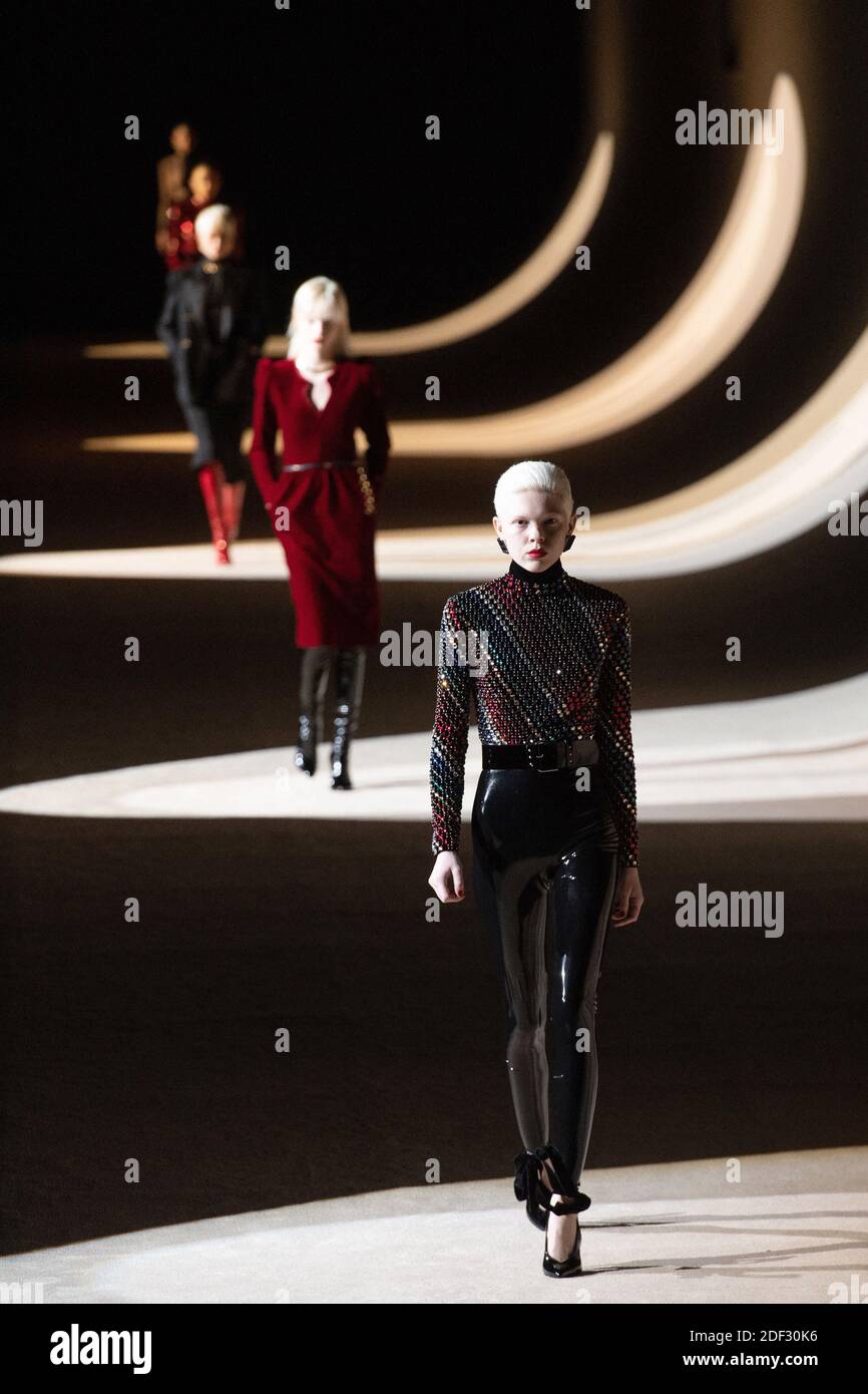 A model walks the runway during the Yves Saint-Laurent show as part of ...