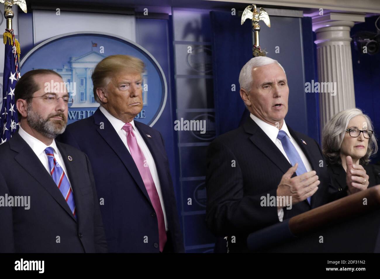 U.S. Vice President Mike Pence peaks during a news conference with ...