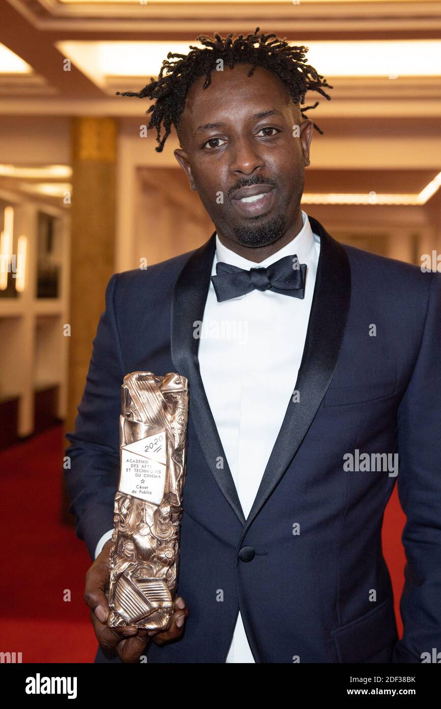 Ladj Ly poses with the Best Film award for the movie Les Miserables ...