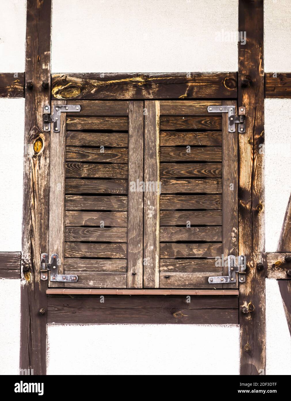 The old wooden shutters of a window of a building Stock Photo - Alamy