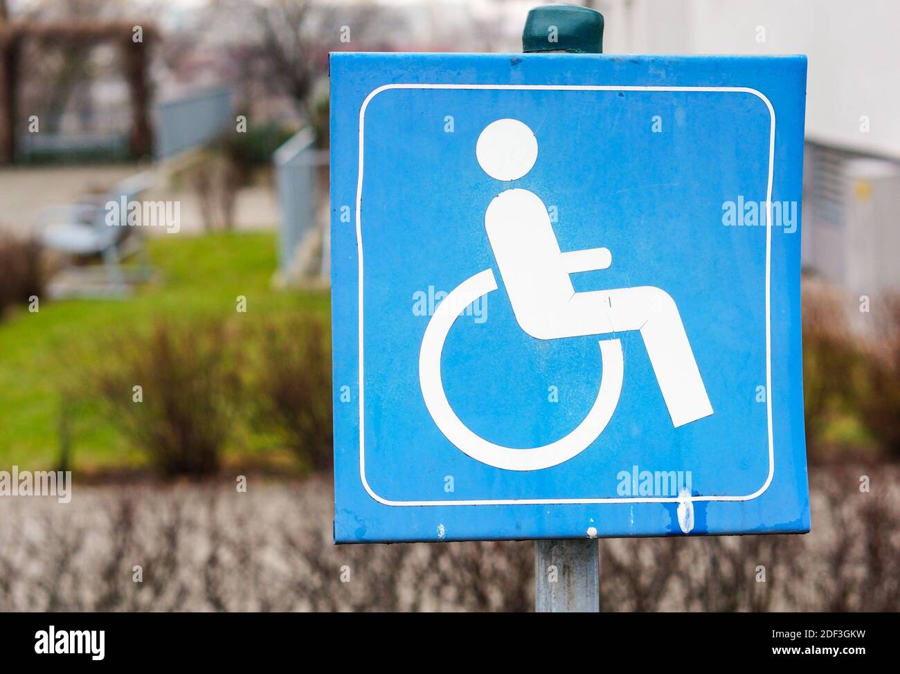 Wheelchair symbol on blue hi-res stock photography and images - Alamy