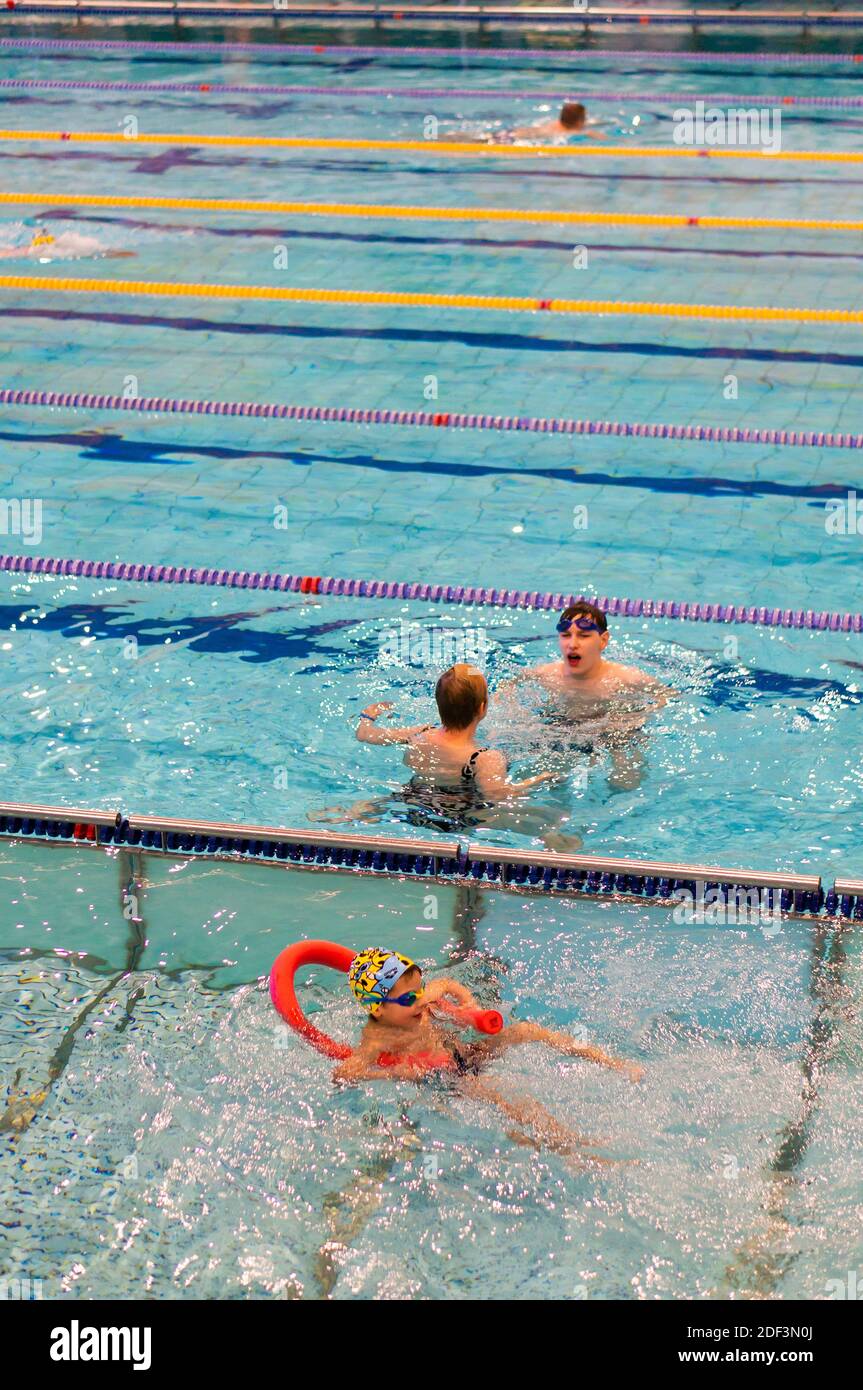 POZNAN, POLAND - Feb 07, 2019: Swimming lessons in a indoor pool Stock ...