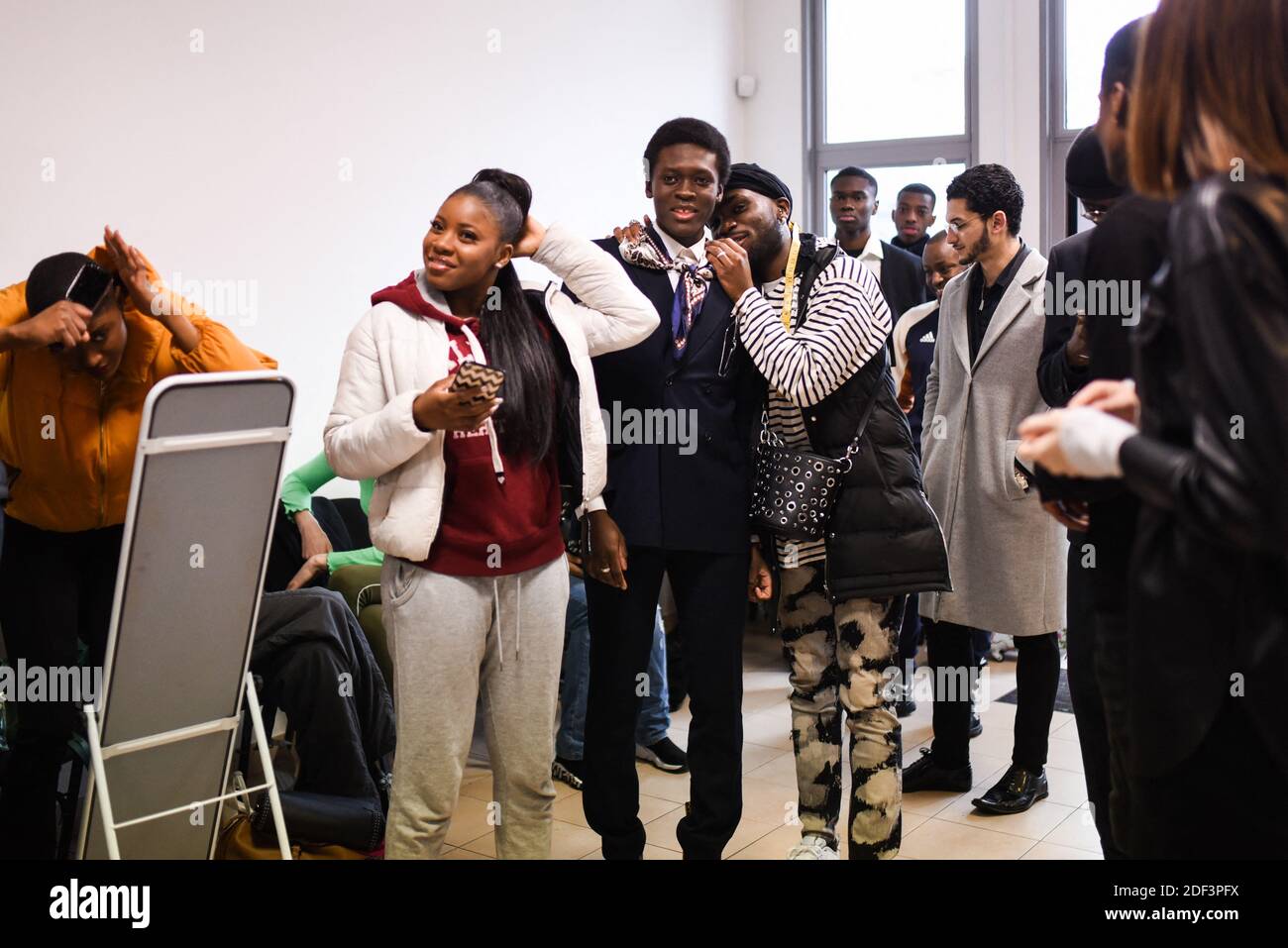 Roby dresses models before the Kipre couture Fall Winter 2020 show on ...
