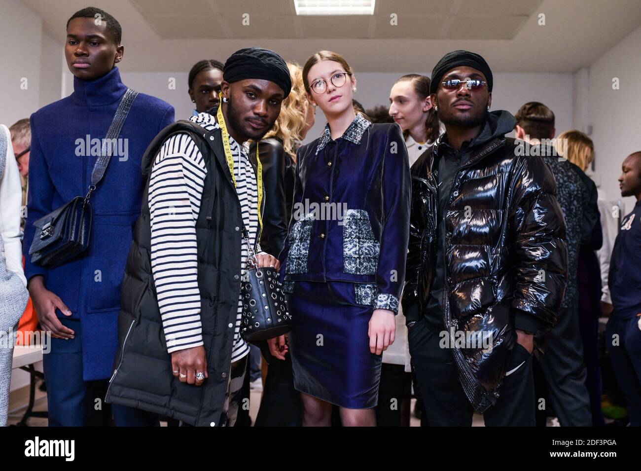 Roby and Ted pose with a model after the Kipre couture Fall Winter 2020 ...