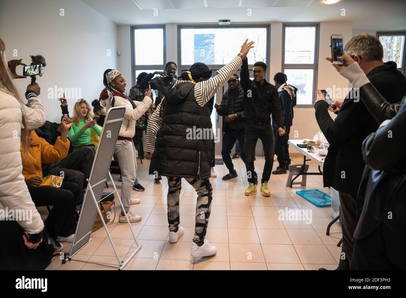 Roby dances with models before the Kipre couture Fall Winter 2020 show ...