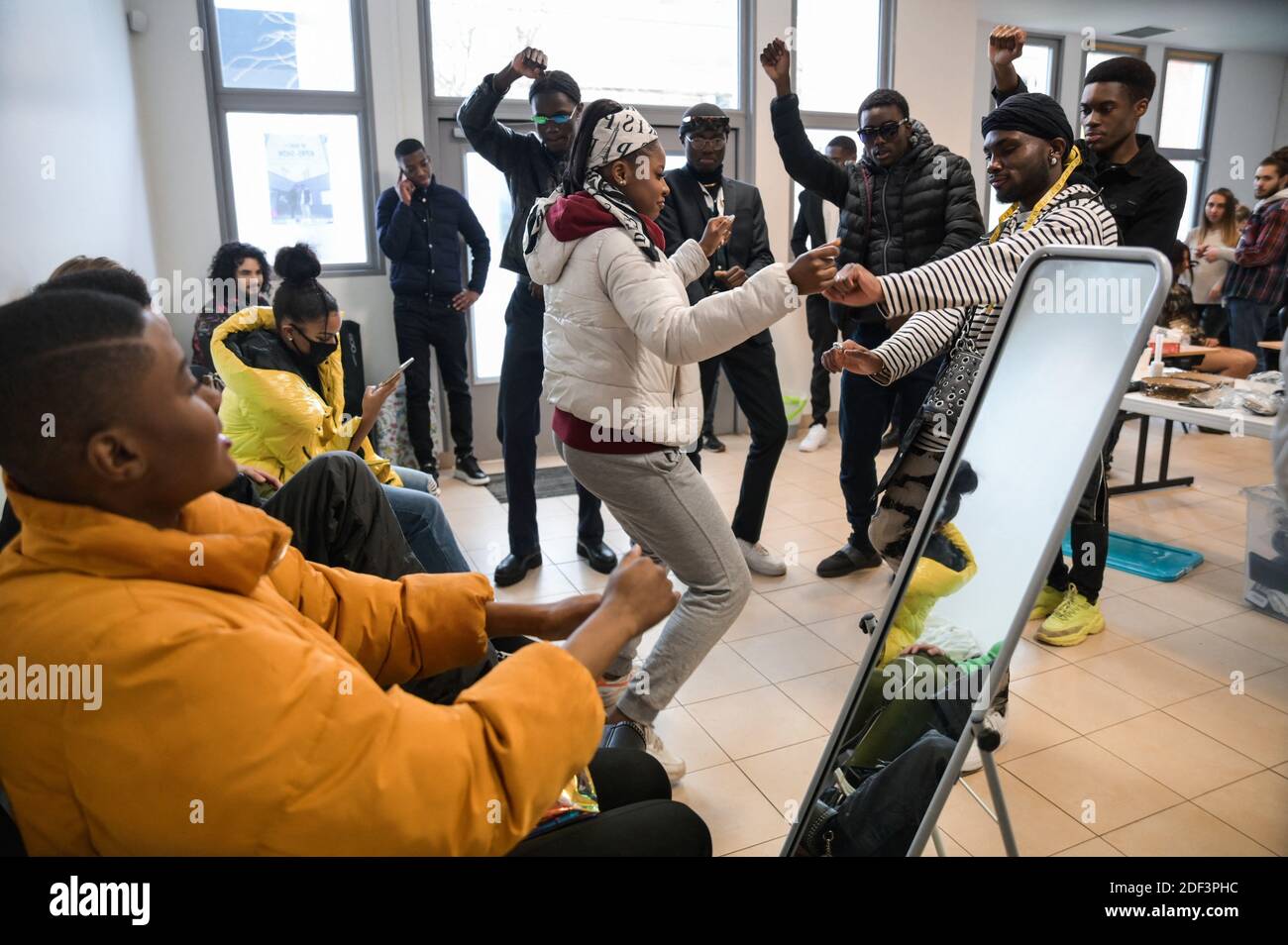 Roby dances with models before the Kipre couture Fall Winter 2020 show ...