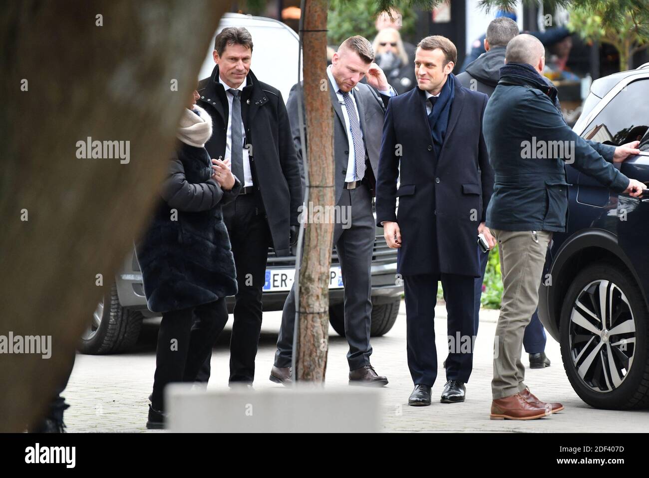 French President Emmanuel Macron leaves his house to return to the ...