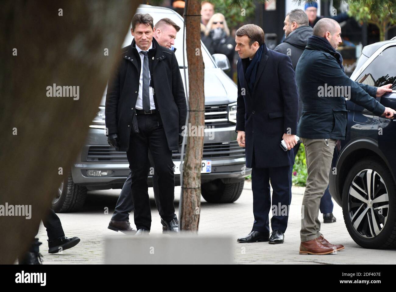 French President Emmanuel Macron leaves his house to return to the ...