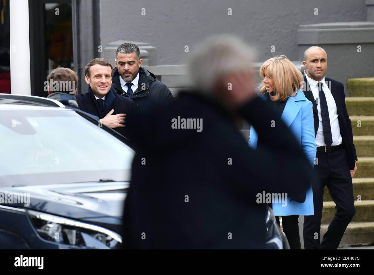 French President Emmanuel Macron and his wife Brigitte Macron leave ...