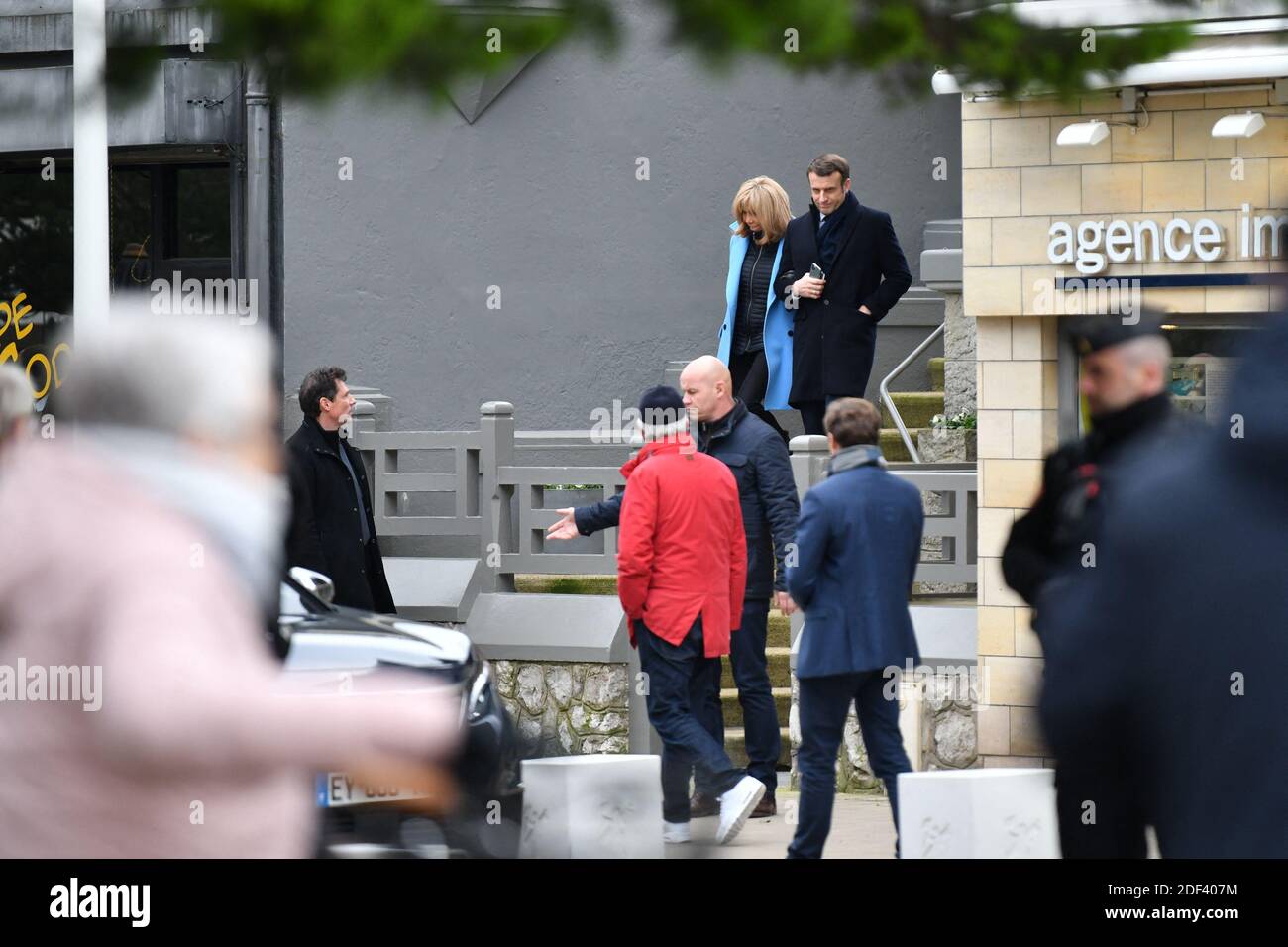 French President Emmanuel Macron and his wife Brigitte Macron leave ...