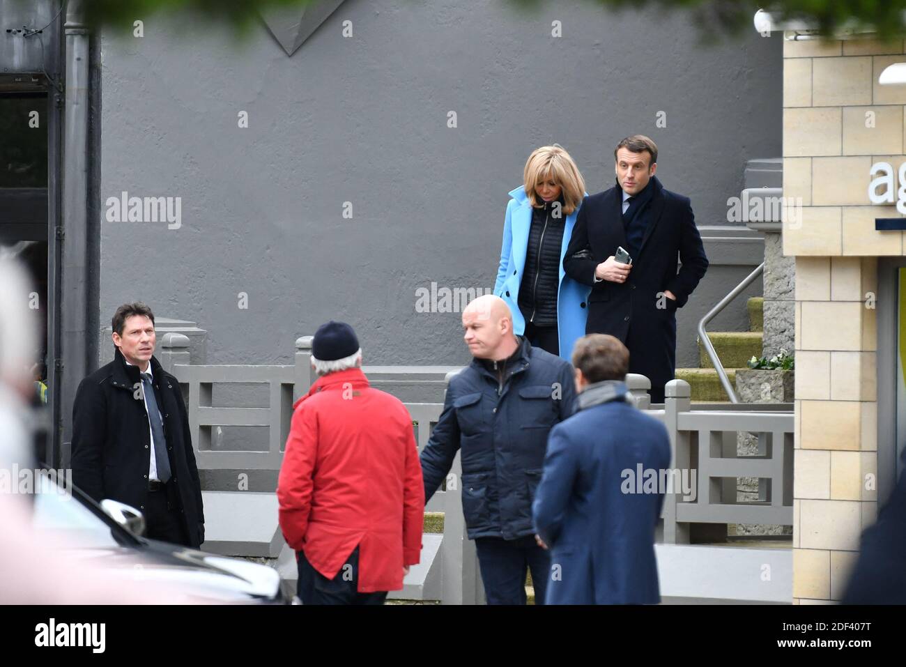 French President Emmanuel Macron and his wife Brigitte Macron leave ...