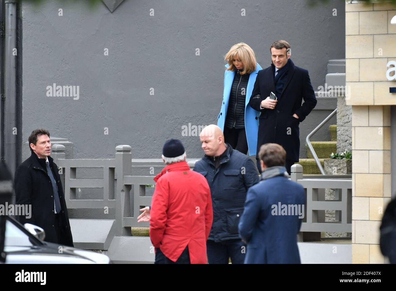French President Emmanuel Macron and his wife Brigitte Macron leave ...