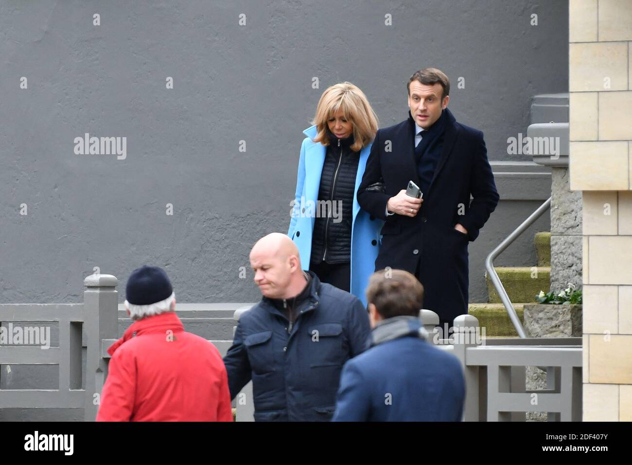 French President Emmanuel Macron and his wife Brigitte Macron leave ...
