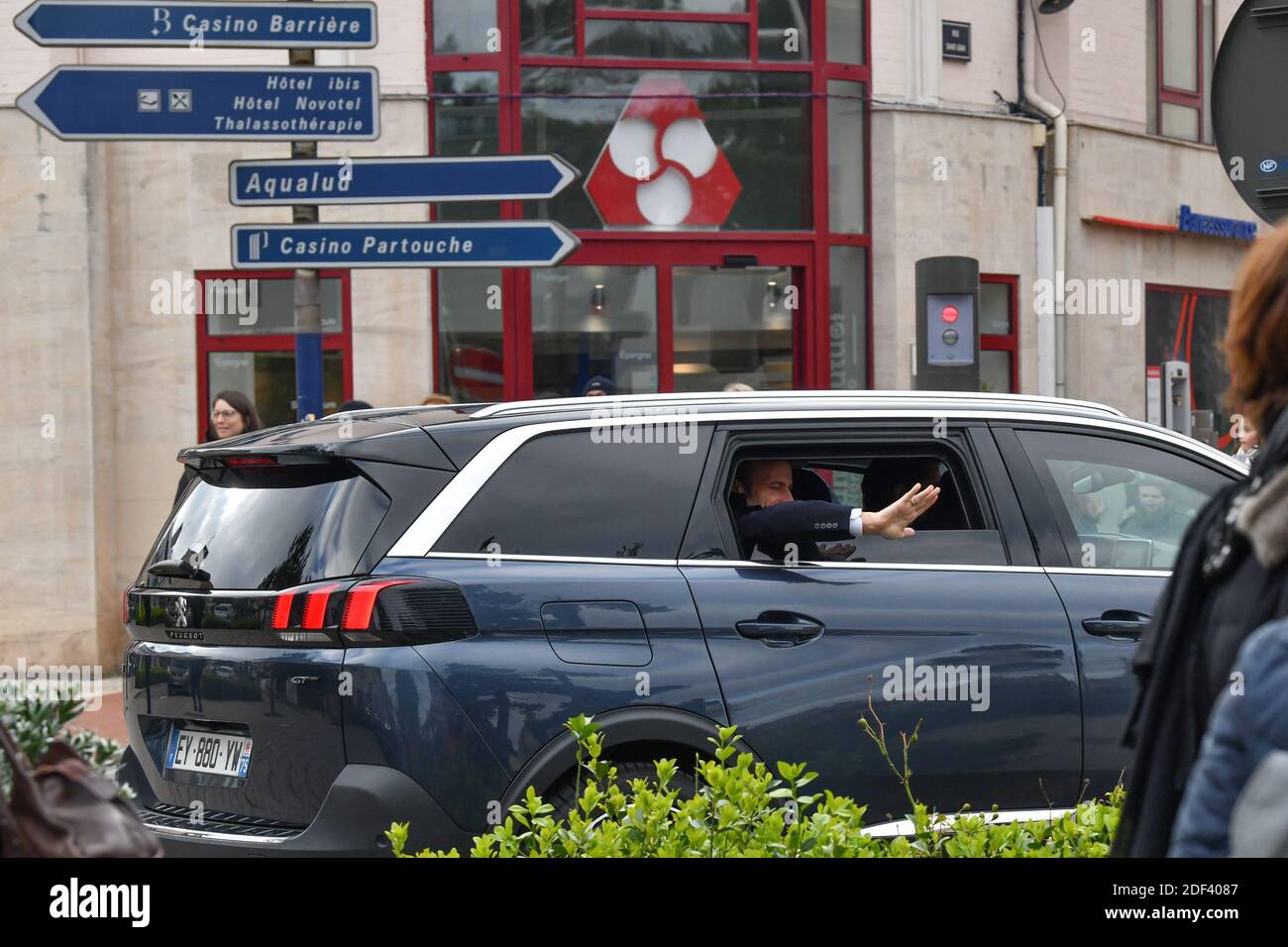 French President Emmanuel Macron leaves his house to return to the ...