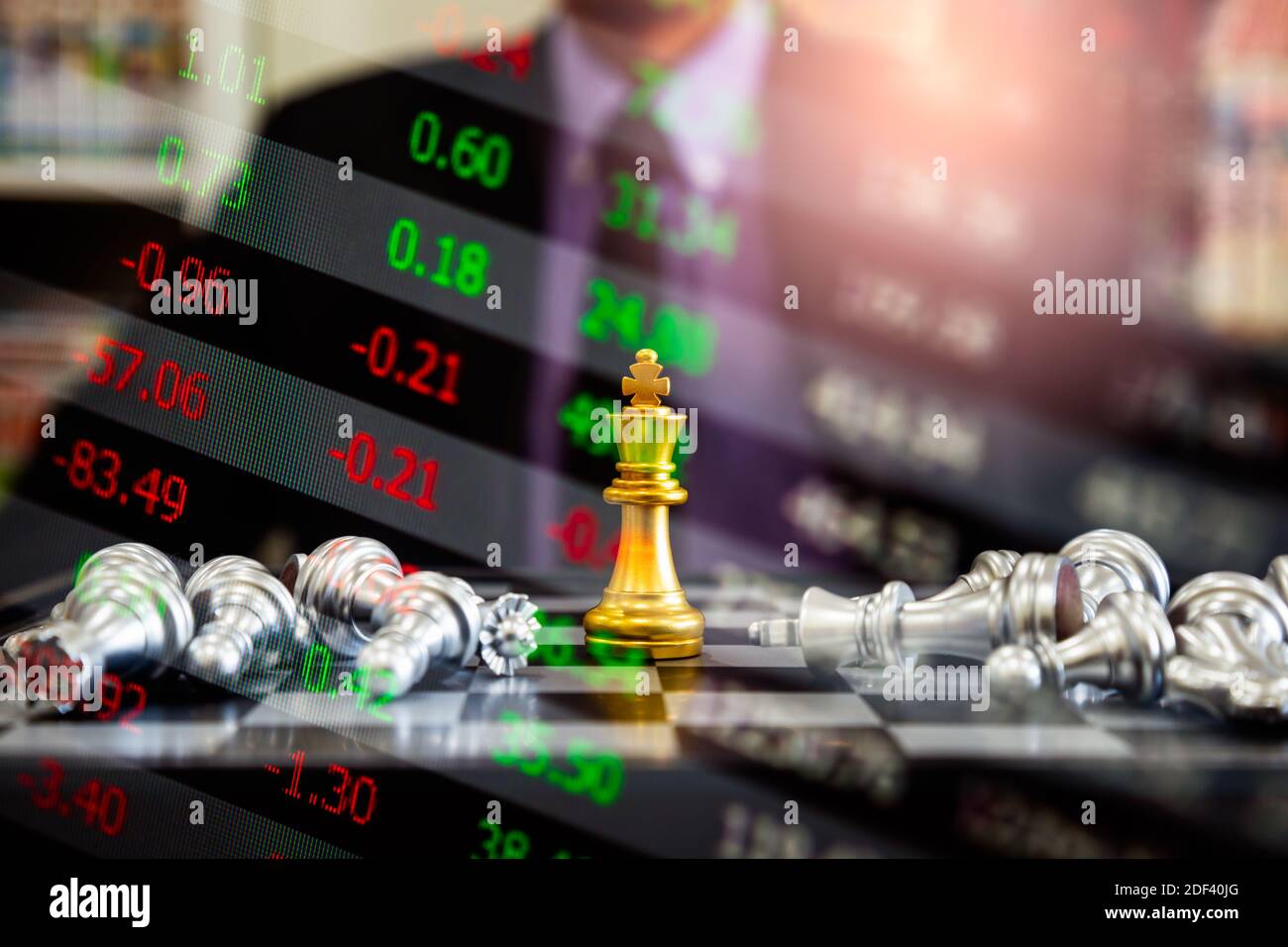 Chess game on chess board behind business man background. Business ...