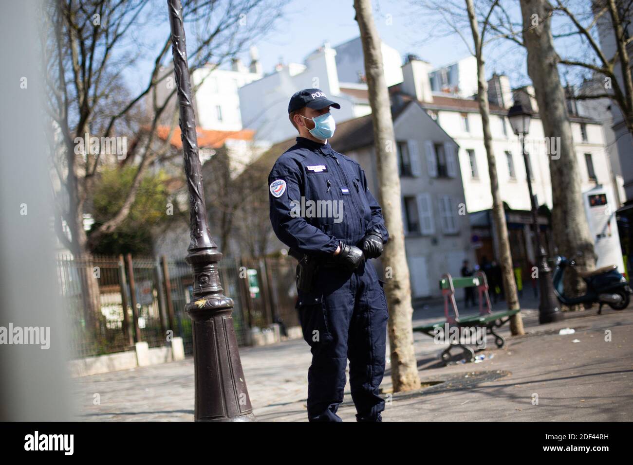 police officer wearing protective masks in the quartier montmartre of ...
