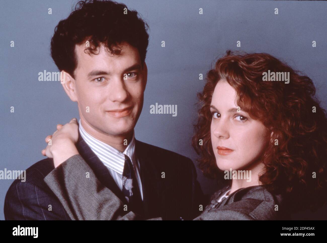Tom Hanks as Josh Baskin and Elizabeth Perkins as Susan Lawrence in Big ...
