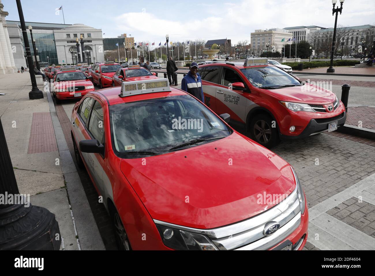 Taxi drivers wait passengers outside the empty Union Station railway ...