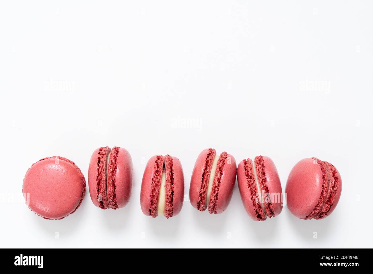 Red color french dessert macarons Stock Photo - Alamy