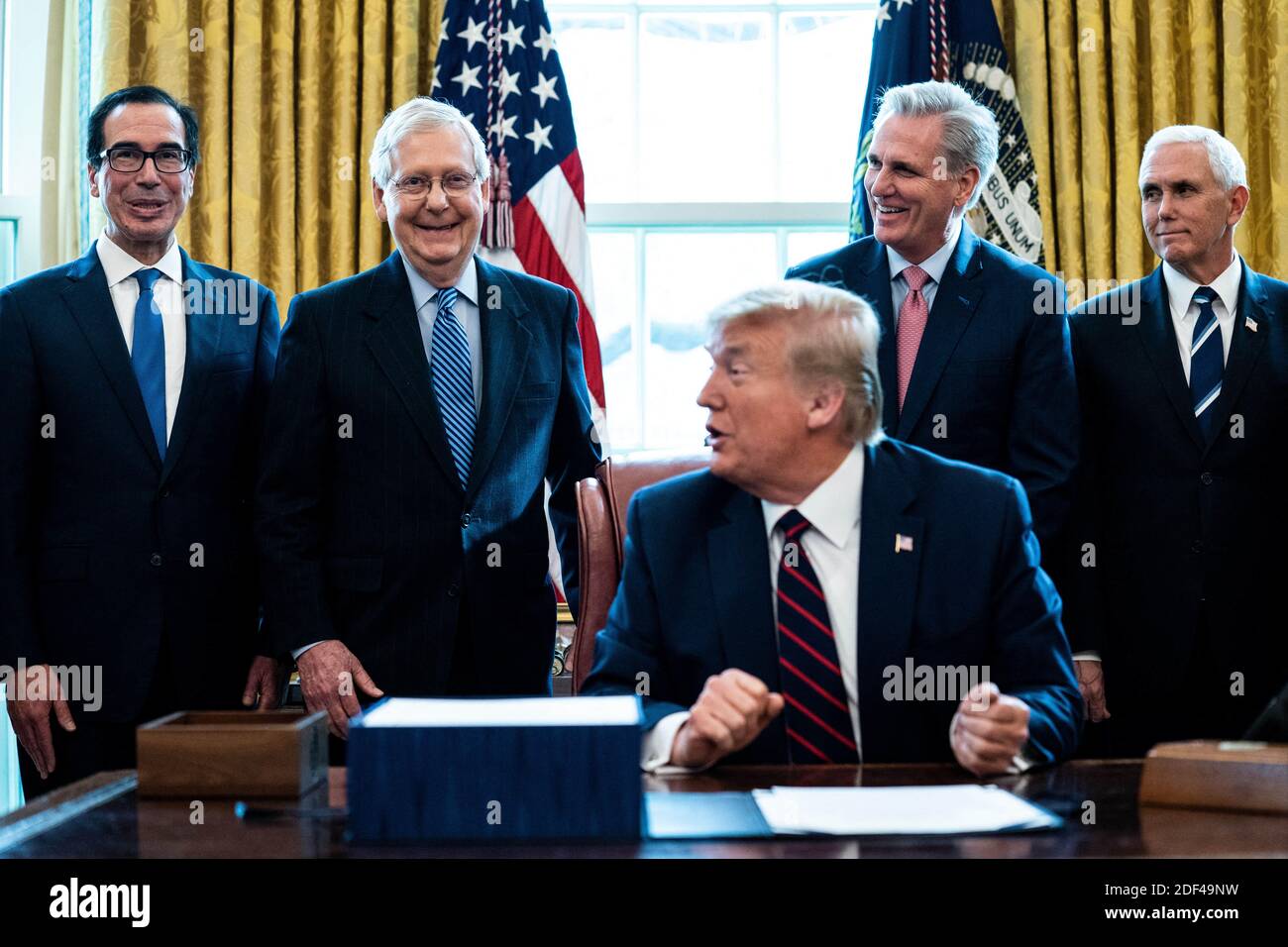 President Donald Trump participates in a signing ceremony for a two ...