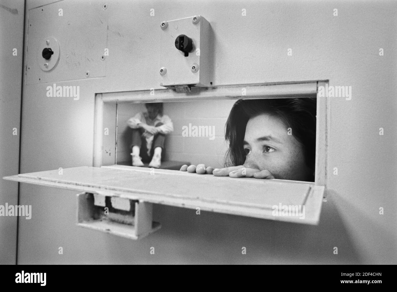 A young girl in a detention cell at a juvenile detention center. ** THE ...