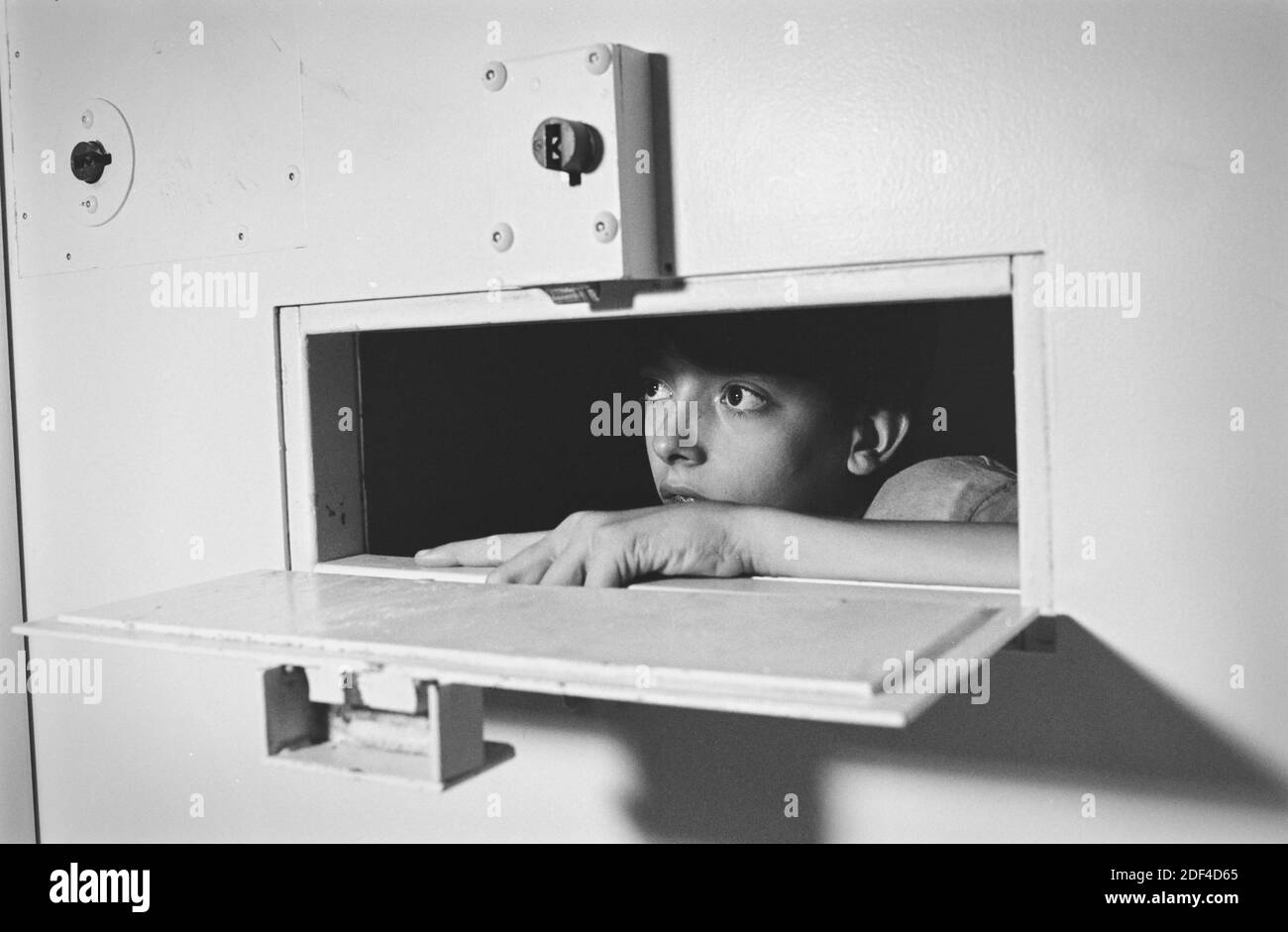 A young boy in a detention cell at a juvenile detention center. ** THE ...