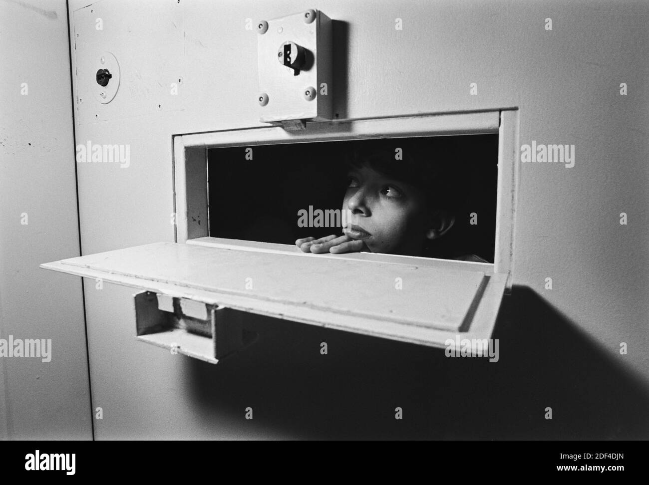 A young boy in a detention cell at a juvenile detention center. ** THE ...