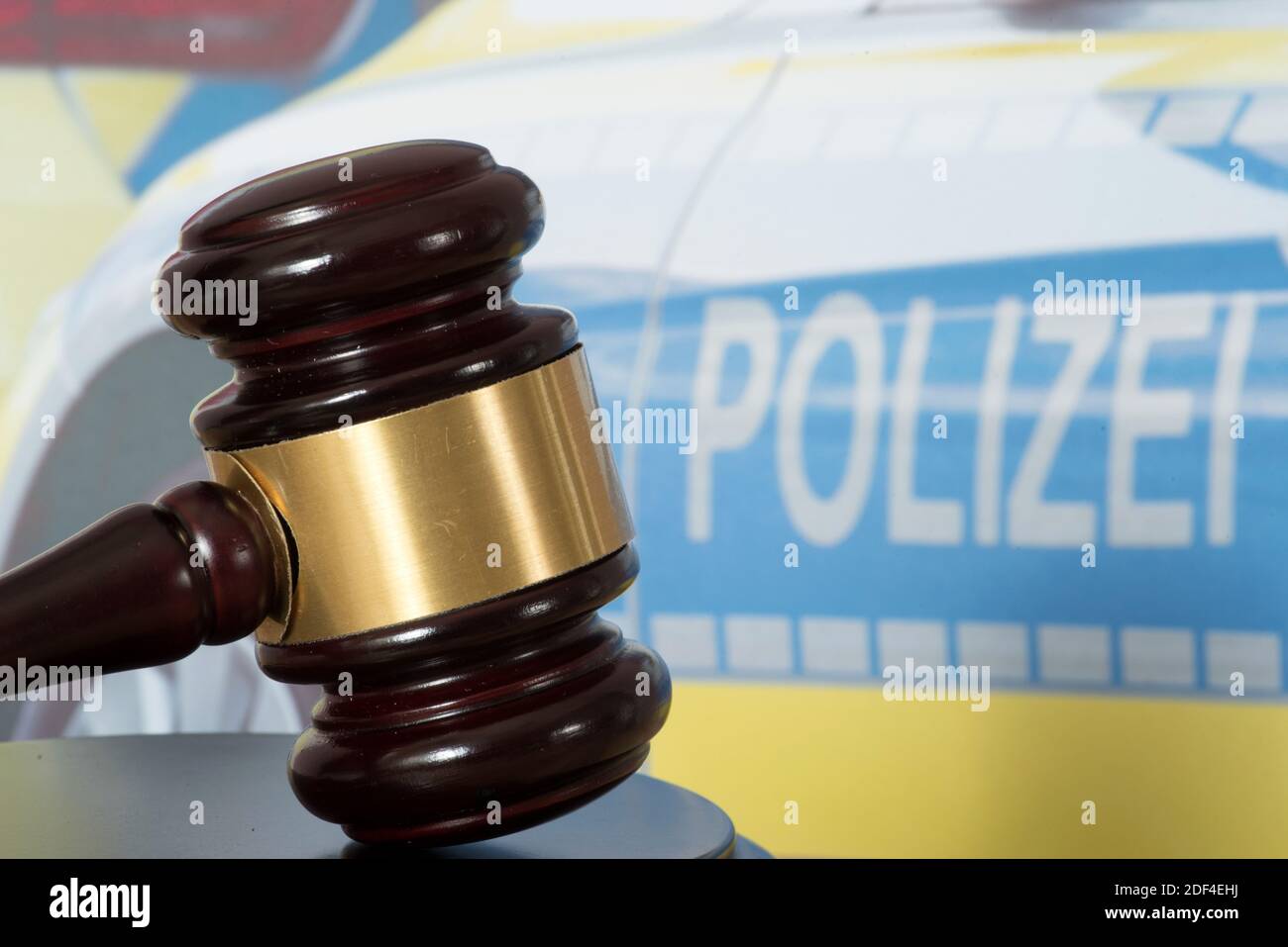 A police car and a judge's gavel Stock Photo - Alamy