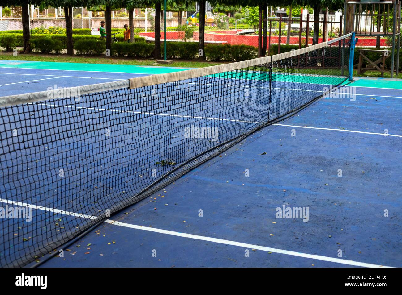 Simple tennis court outdoor in summer town. Tennis club outdoor. Summer ...