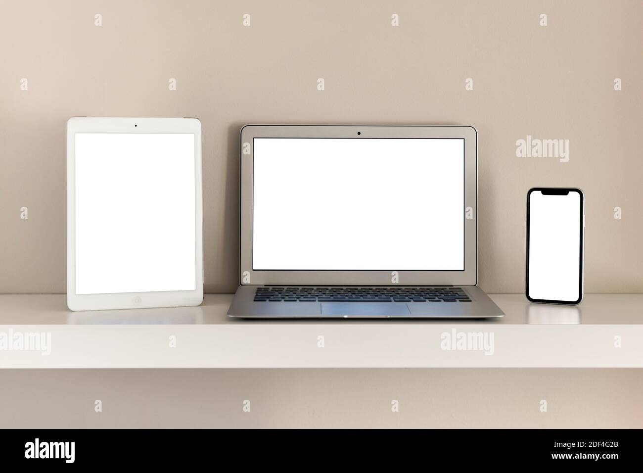 Set of mobile gadgets with blank white screen. Tablet, laptop and ...