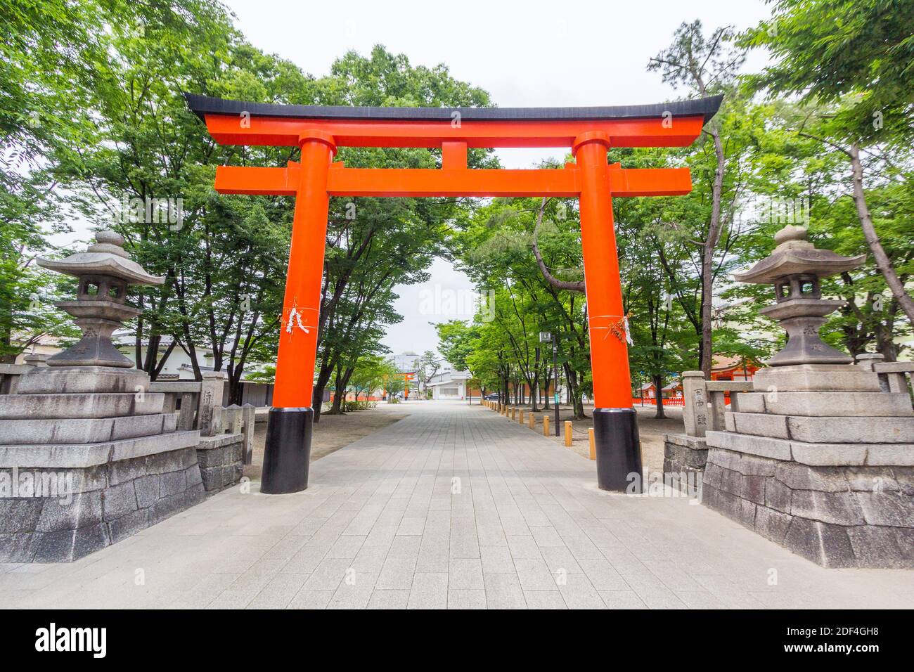 One of the many vermillion torii gates inside the Fushimi Inari Taisa ...