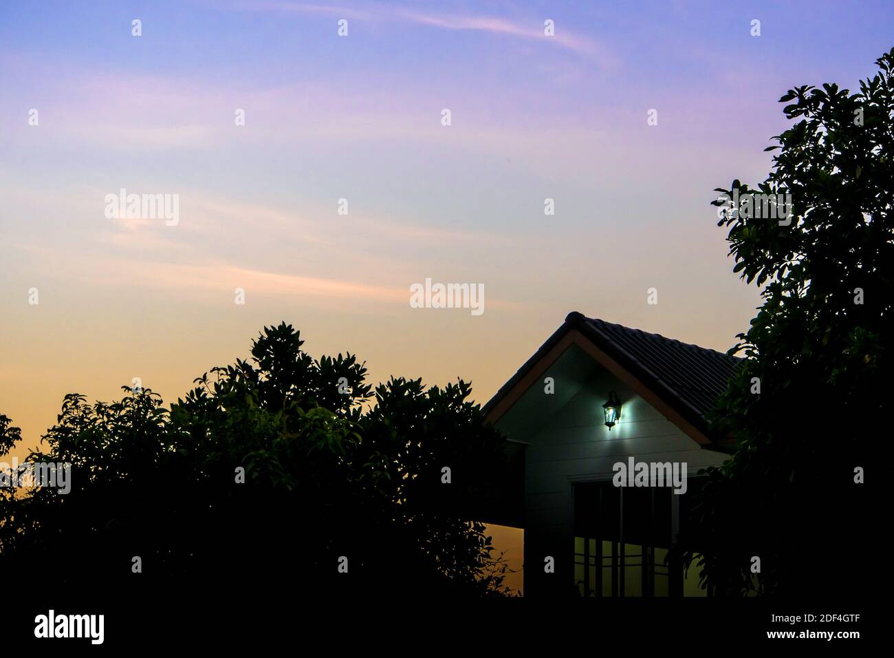 Silhouette of house and small lighting in the morning Stock Photo - Alamy
